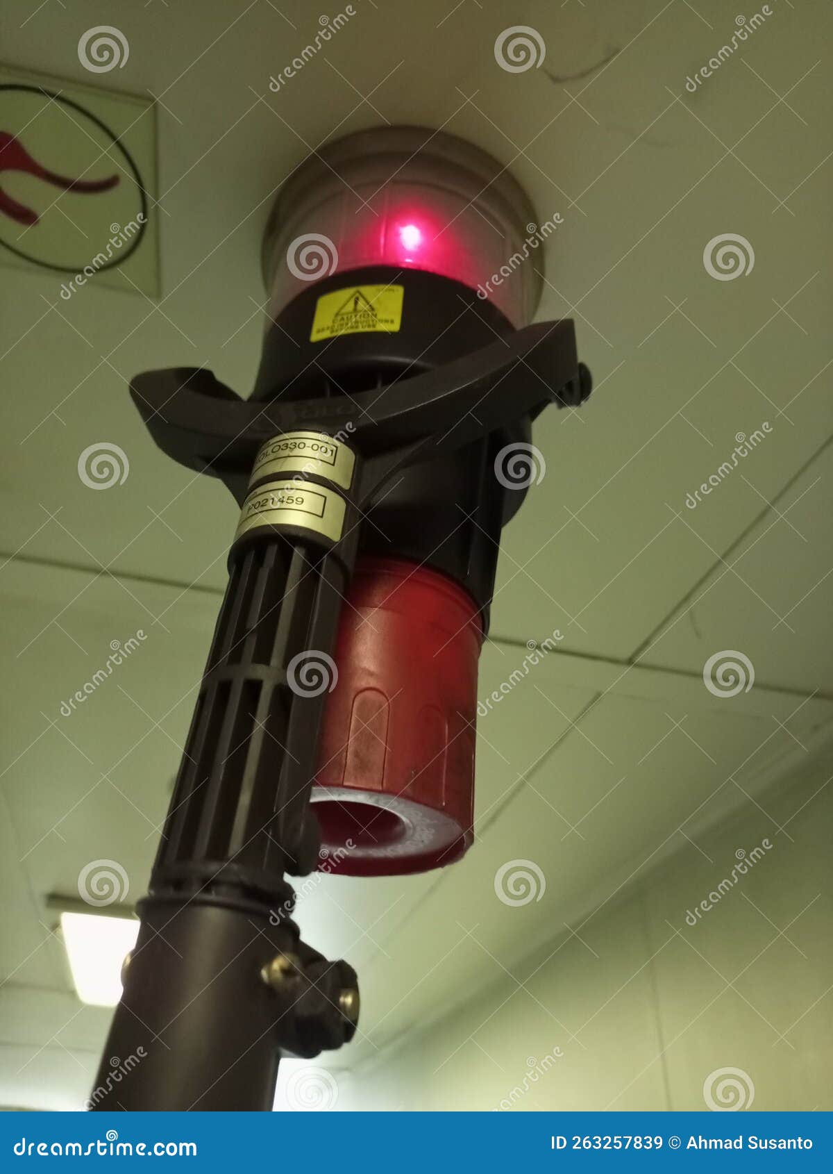 Smoke detector test. editorial stock image. Image of alarm - 263257839