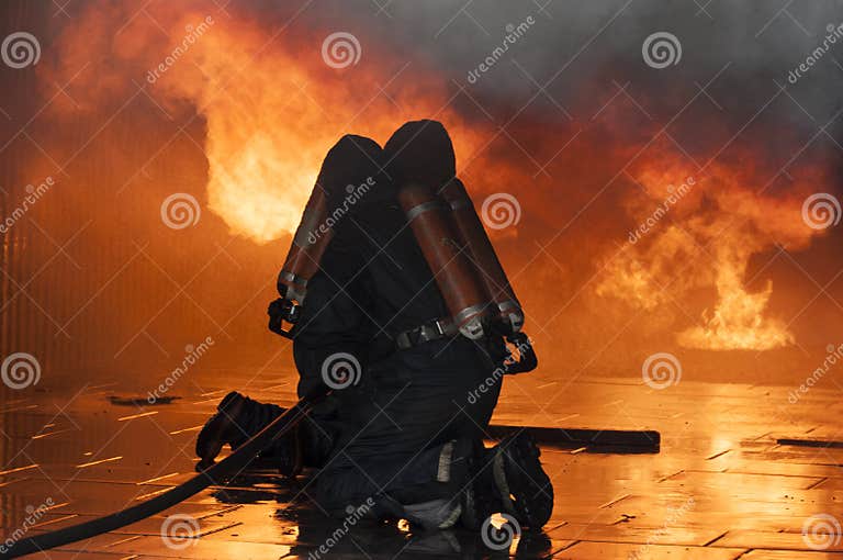 Smoke diving firefighters editorial stock photo. Image of excersise ...