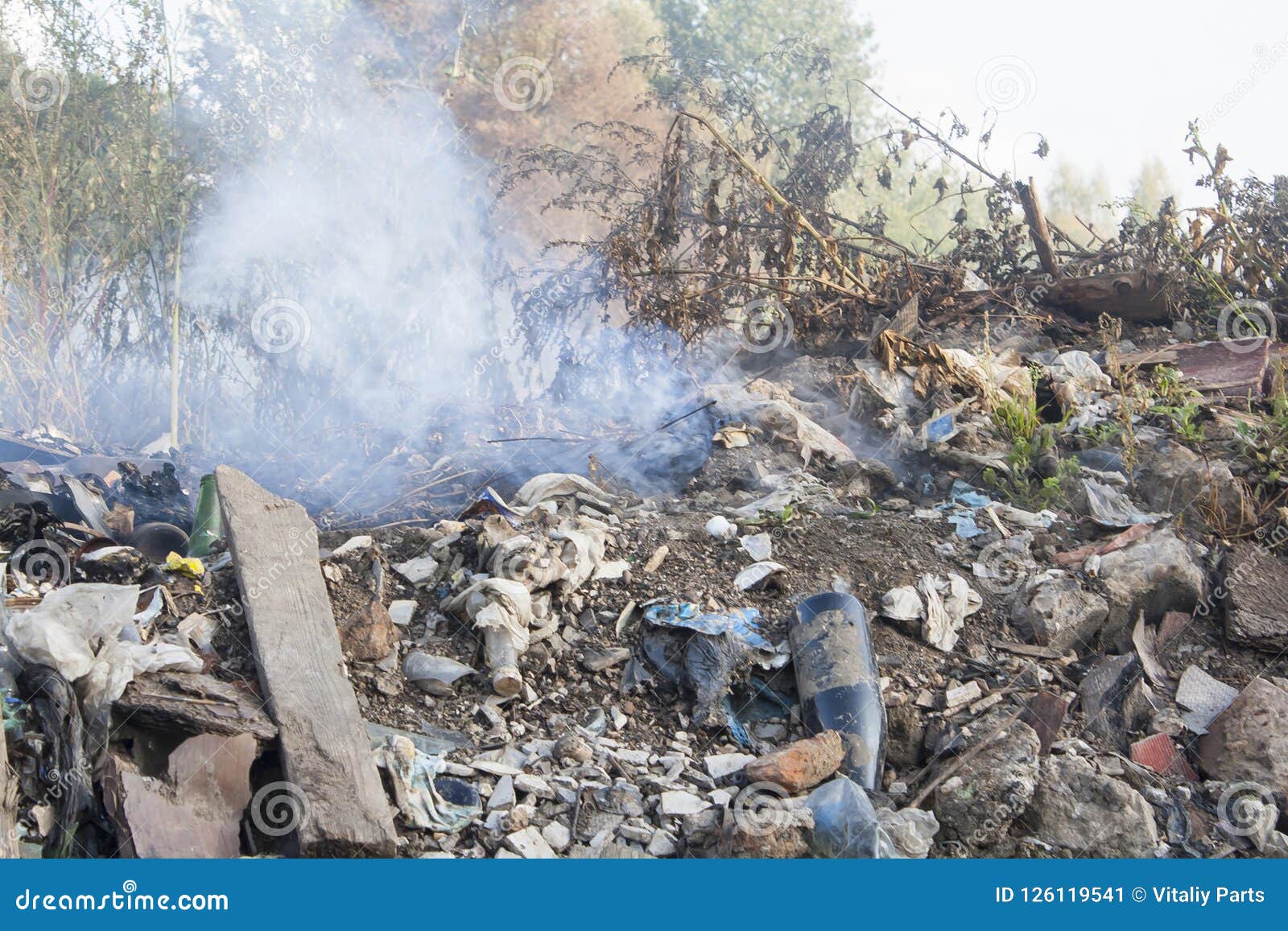 Smoke in a garbage dump stock image. Image of refuse - 126119541