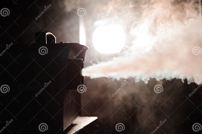 Smoke Machine in Action. Smoke in the Dark. Stock Image - Image of burn ...