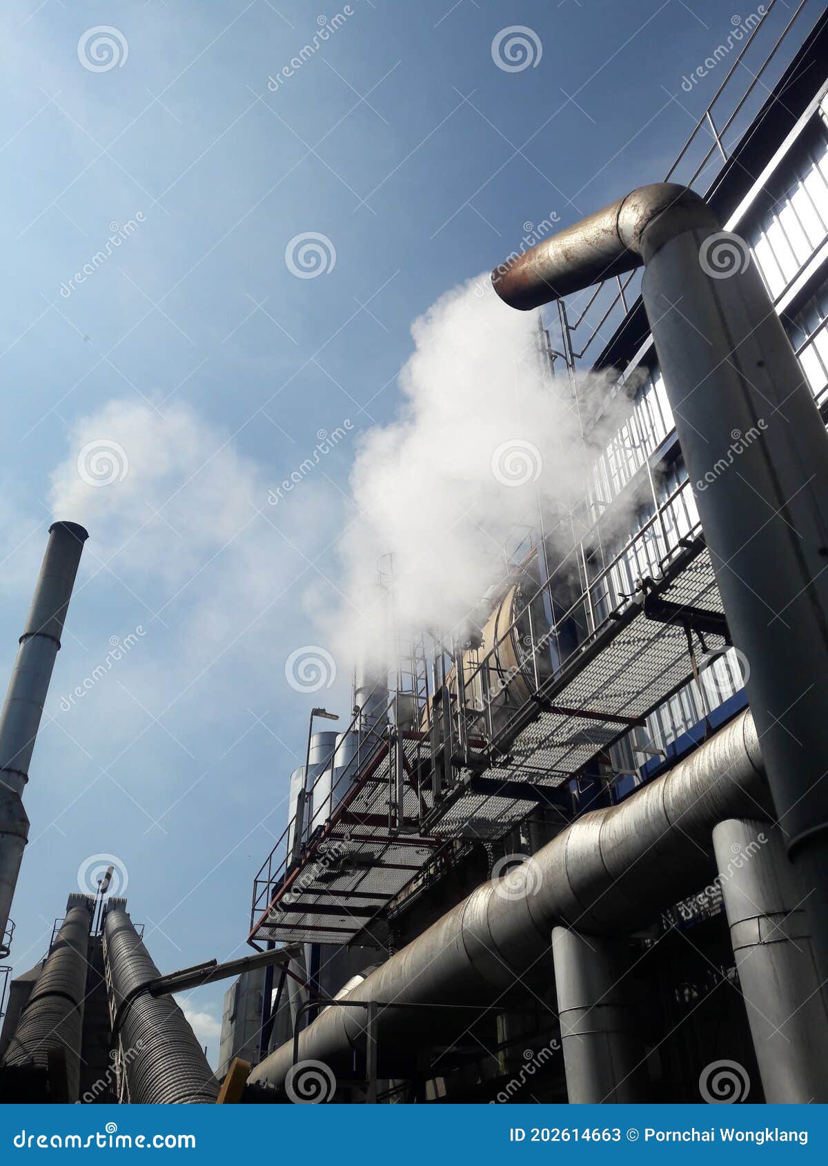 Smoke From The Boiler Stack And The Vapor From A Cooling Tower In The ...