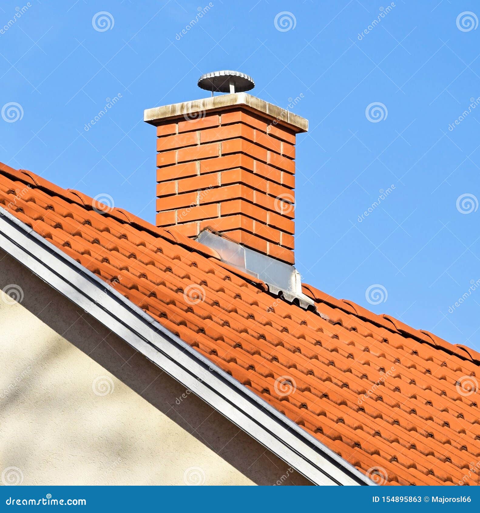 Smoke Stack on the Roof of a House Stock Image - Image of slate, tile ...