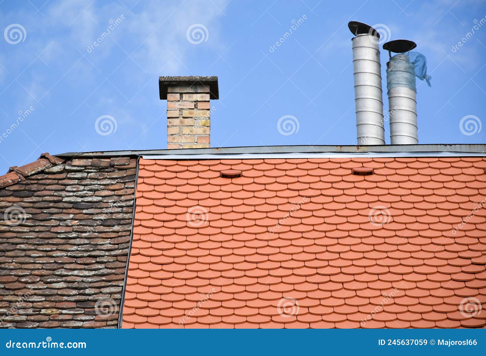 Smoke Stacks on the Roof of a House Stock Image - Image of stack, blue ...