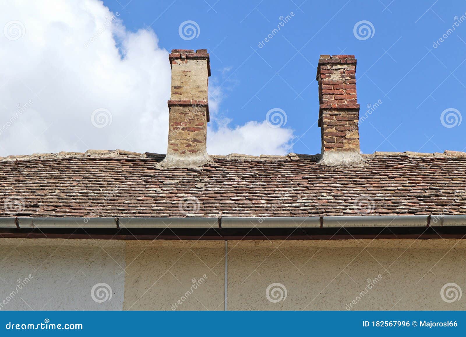 Smoke Stacks on the Roof of an Old Building Stock Photo - Image of roof ...