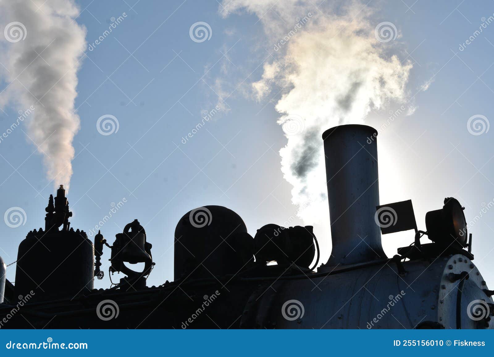 Smoke and Steam are Released from the Engine of an Old Train Locomotive ...