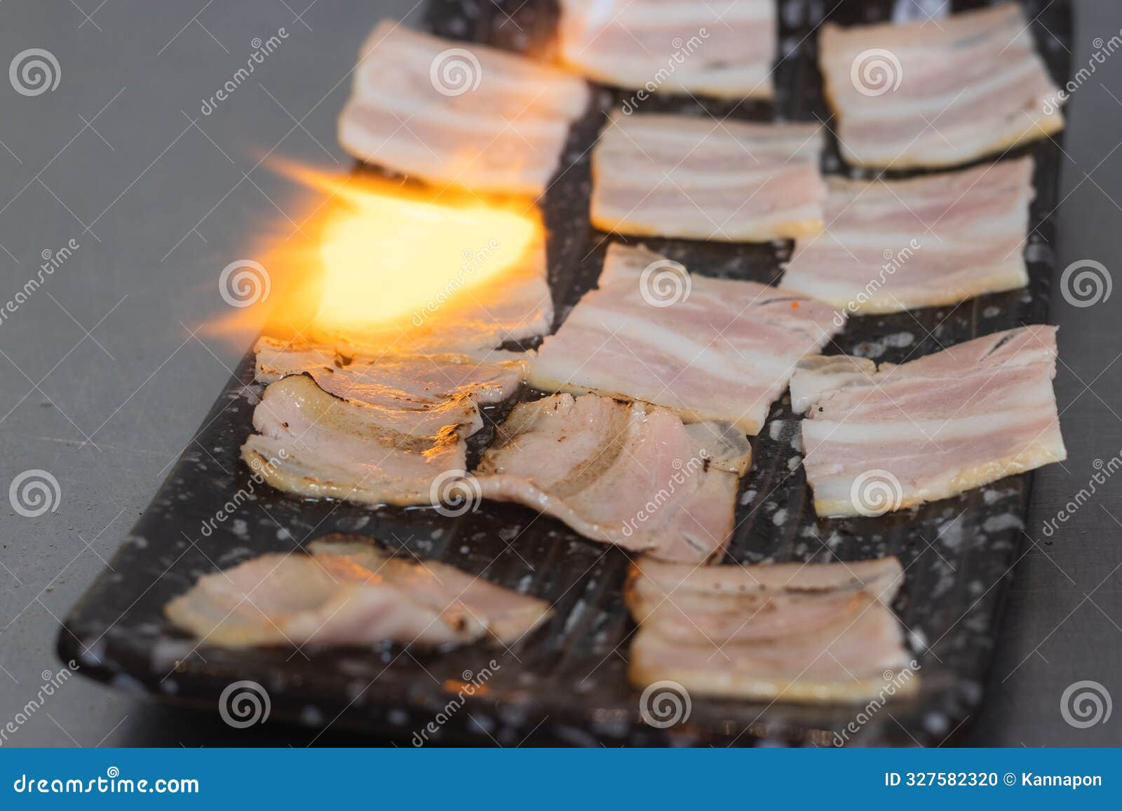 Smoked Bacon Burned with a Flamethrower on a Ceramic Pan Stock Photo ...