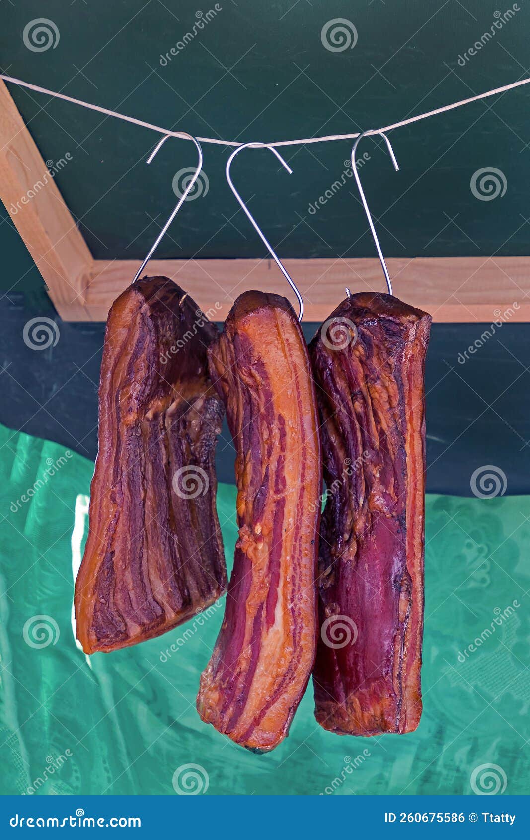 Smoked Bacon Hanging on a String Stock Photo - Image of bacon, cured ...