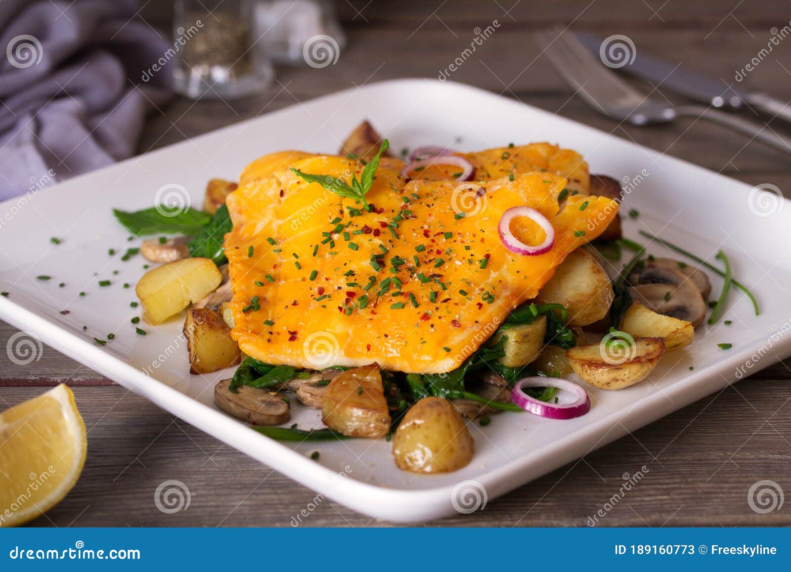 Smoked Cod Fish Fillets with Potatoes, Mushrooms and Spinach. Stock ...