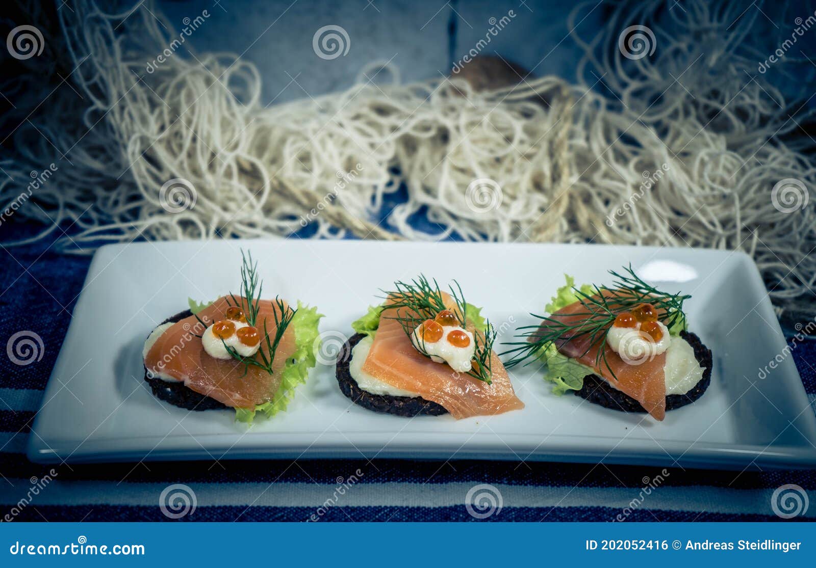 Smoked fish canapes stock photo. Image of beach, ocean - 202052416