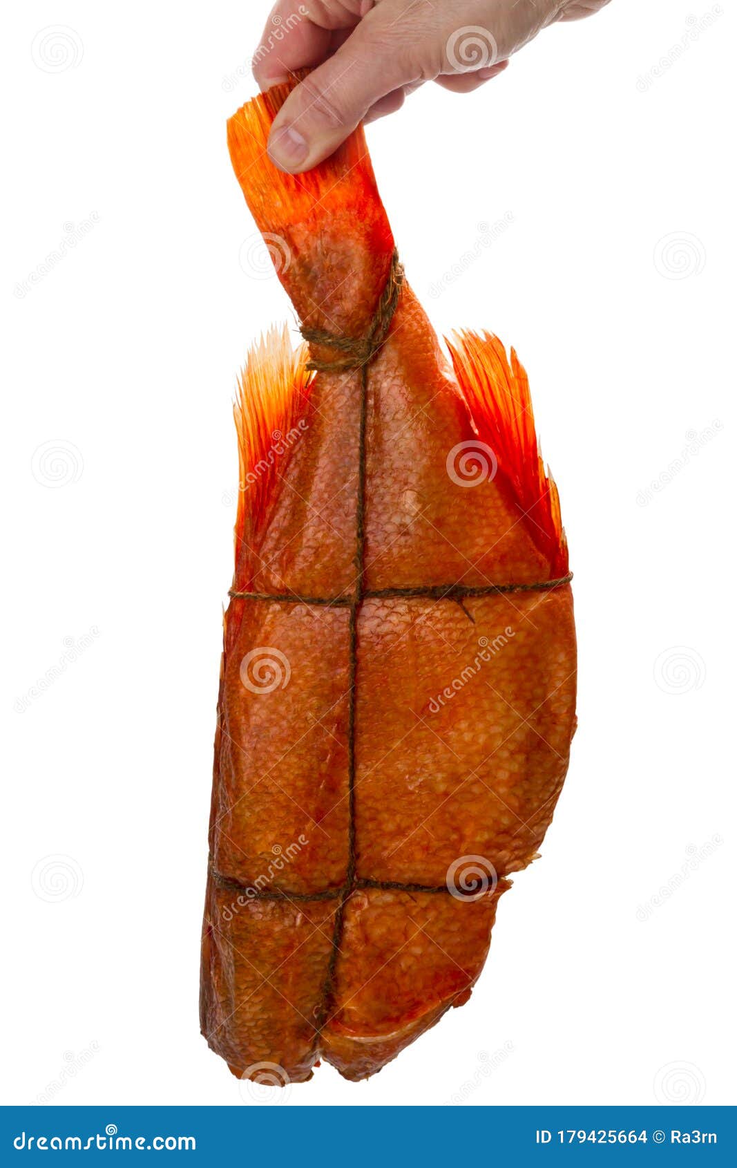 Smoked Perch Carcass in the Hand Stock Photo - Image of smoked, fish ...