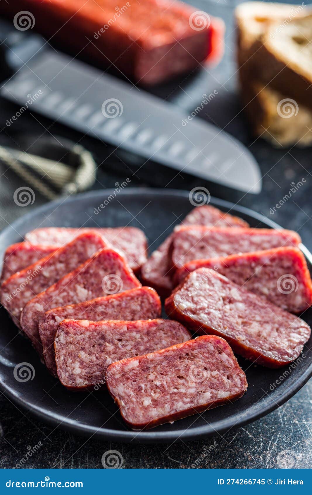 Smoked .sausage. Sliced Salami on Plate Stock Image - Image of ...