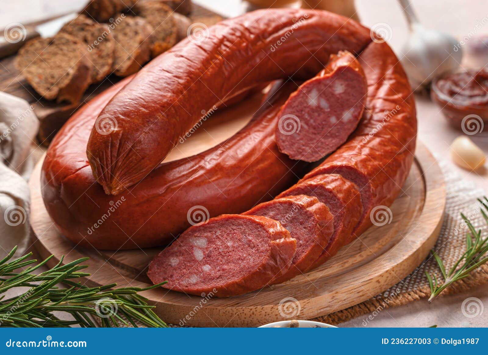 Smoked, Spicy Sausage with Fresh Basil Close-up. Stock Image - Image of ...