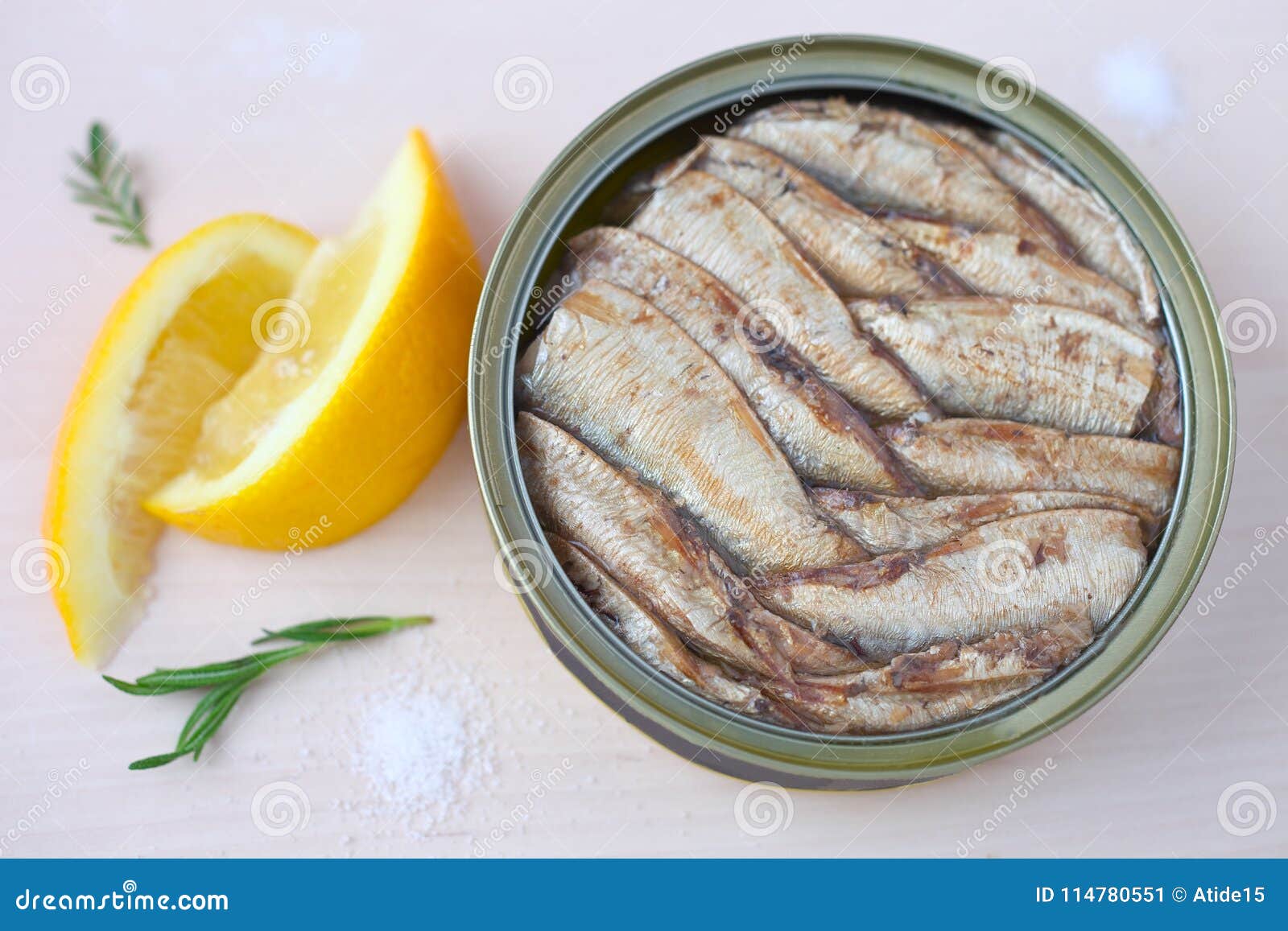 Sprats Fish On Inox Fork Above Metal Jar, Smoked Herring. Close Up ...