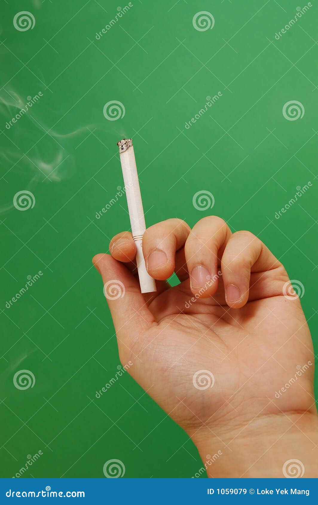 Smoking stock image. Image of hand, finger, palm, green - 1059079