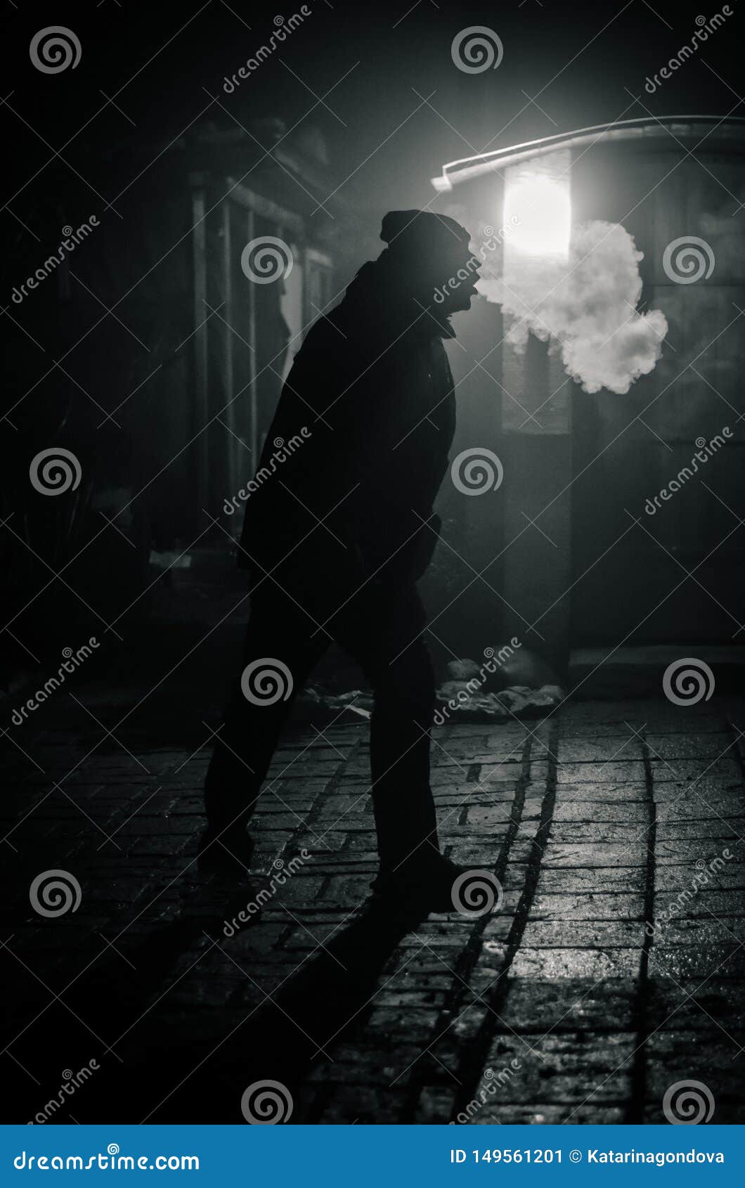 Smoking alone at night stock image. Image of male, face - 149561201