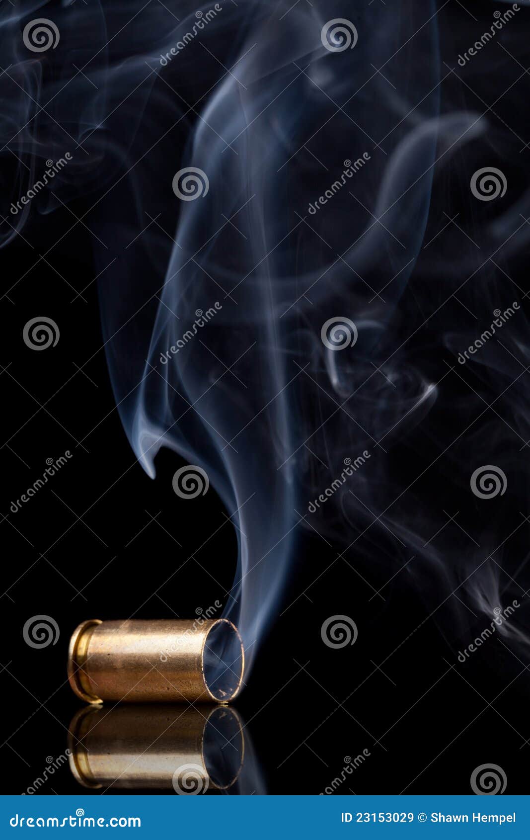Smoking bullet casing stock image. Image of shell, ammunition - 23153029