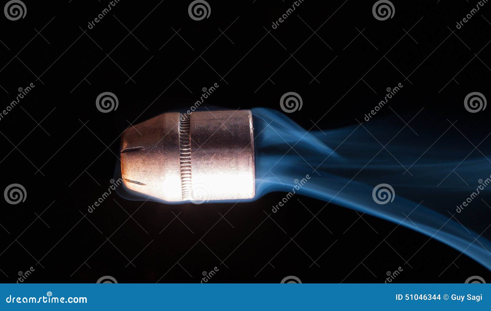Smoking bullet stock photo. Image of blue, ammo, smoking - 51046344