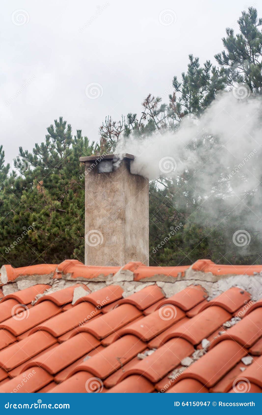 Smoking chimney in winter stock image. Image of round - 64150947