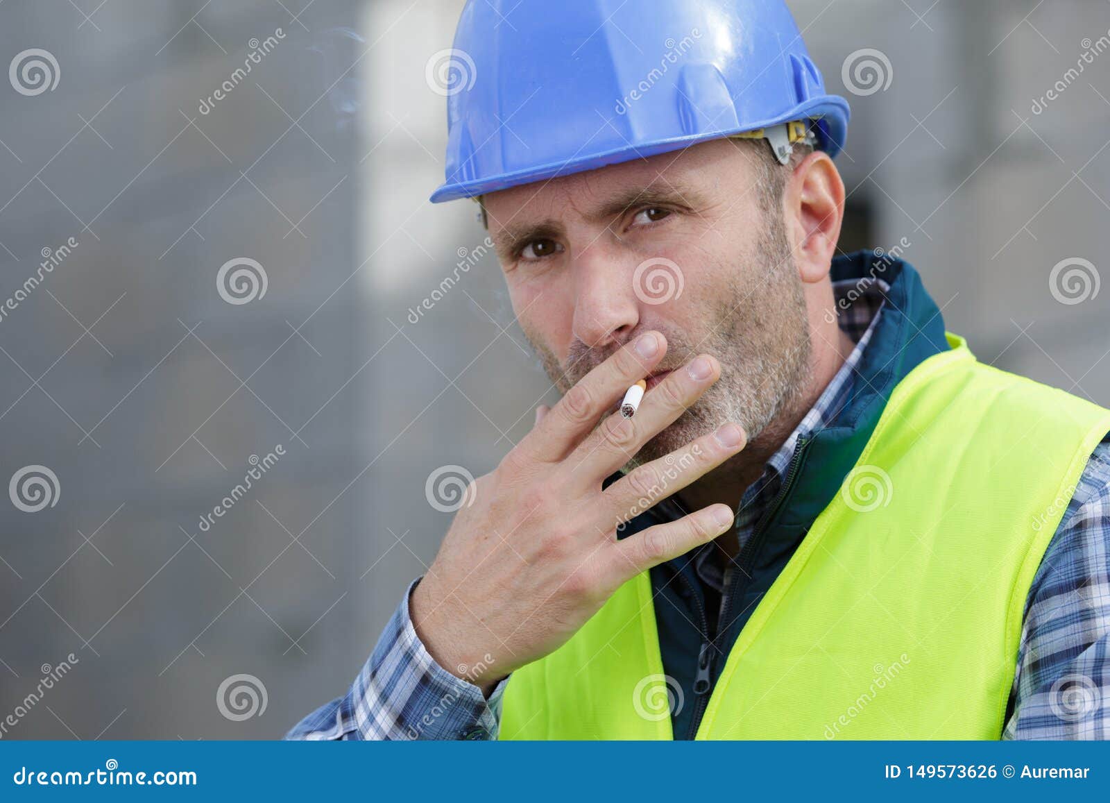 Smoking Cigarette on Construction Site Stock Photo - Image of outdoors ...