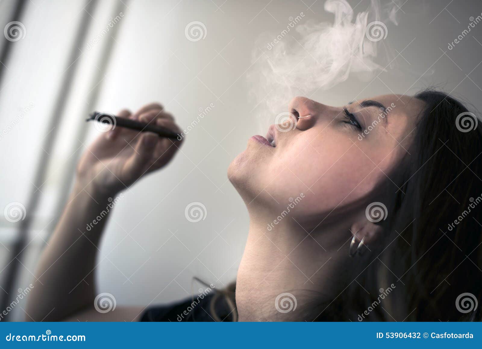 Smoking cute girl. stock photo. Image of healthy, colored - 53906432