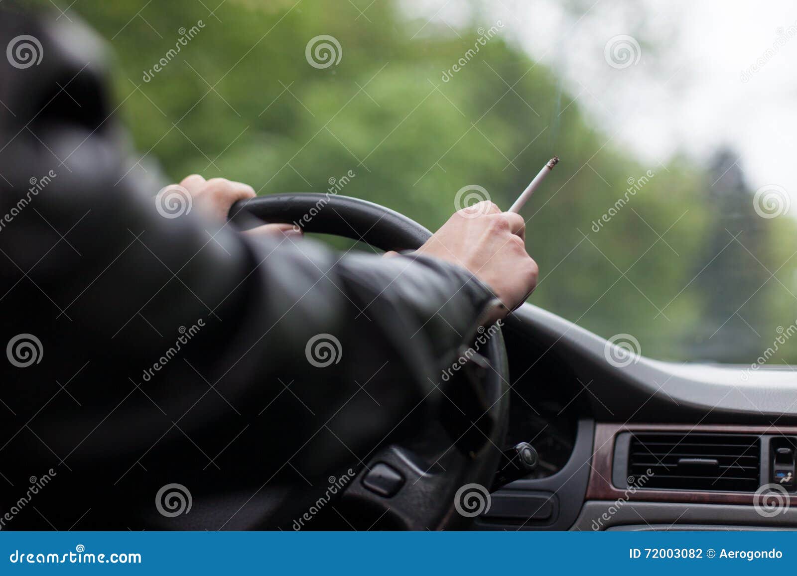 Smoking and driving stock photo. Image of smoke, detail - 72003082
