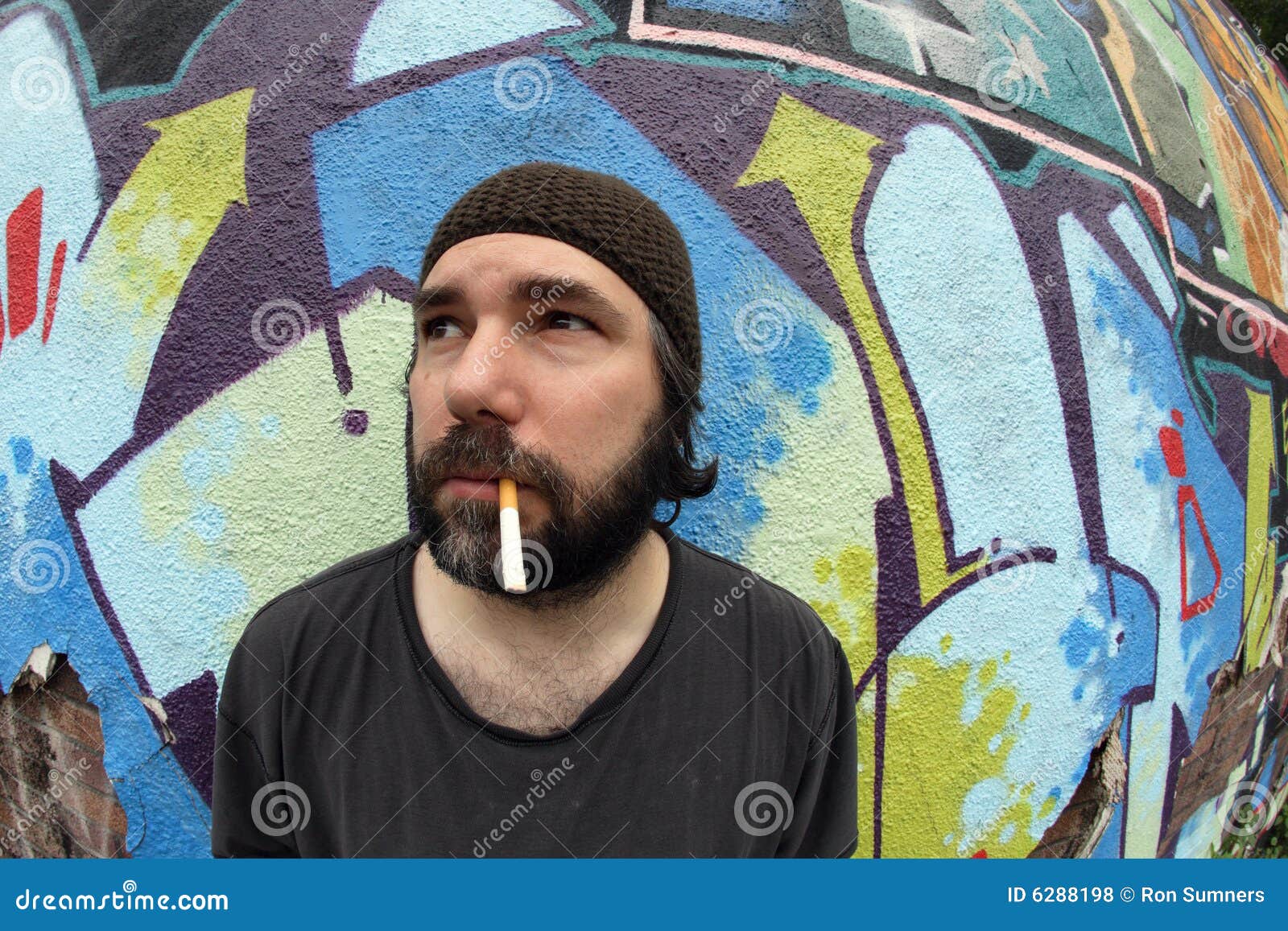Smoking homeless man stock photo. Image of wall, outside - 6288198