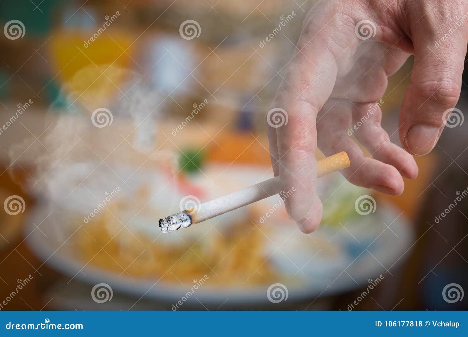 Smoking in Restaurant. Man is Holding Cigarette in Bar Stock Photo ...