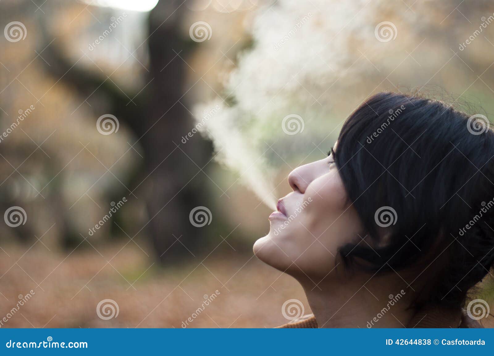 Smoking woman stock photo. Image of beauty, smiling, blue - 42644838