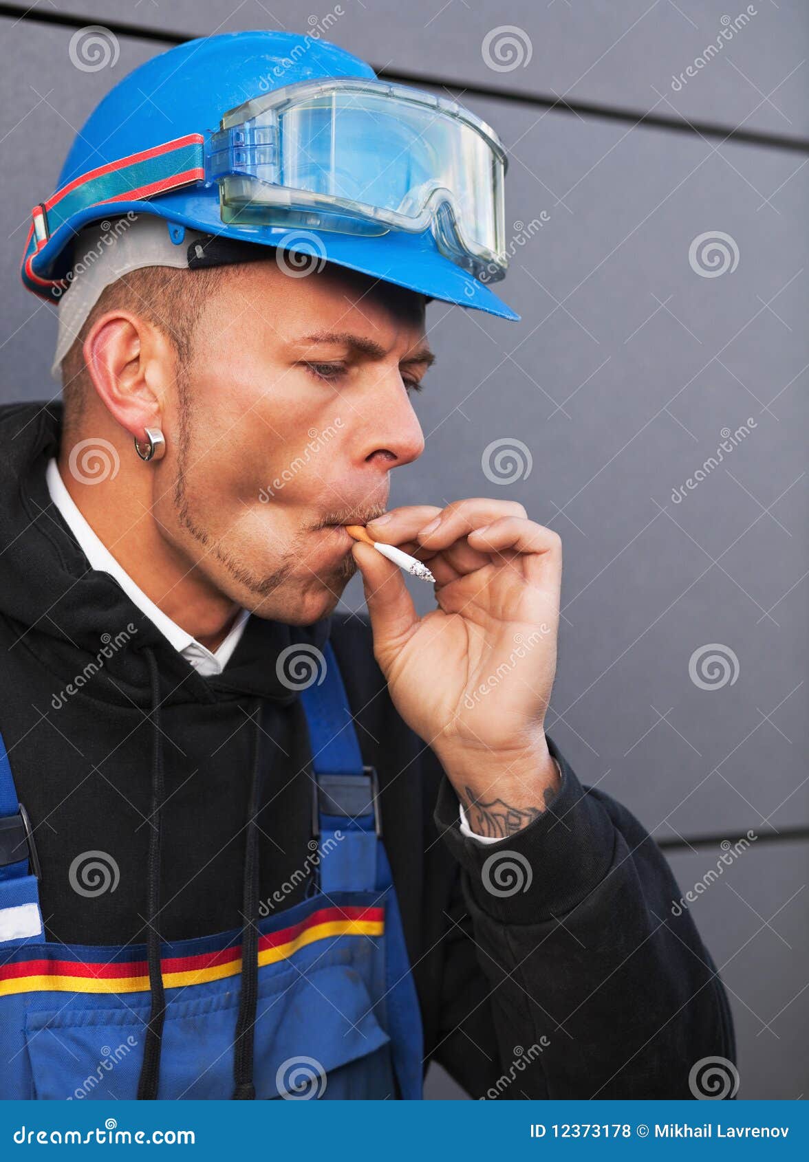 Smoking worker stock photo. Image of smoke, cigarette - 12373178