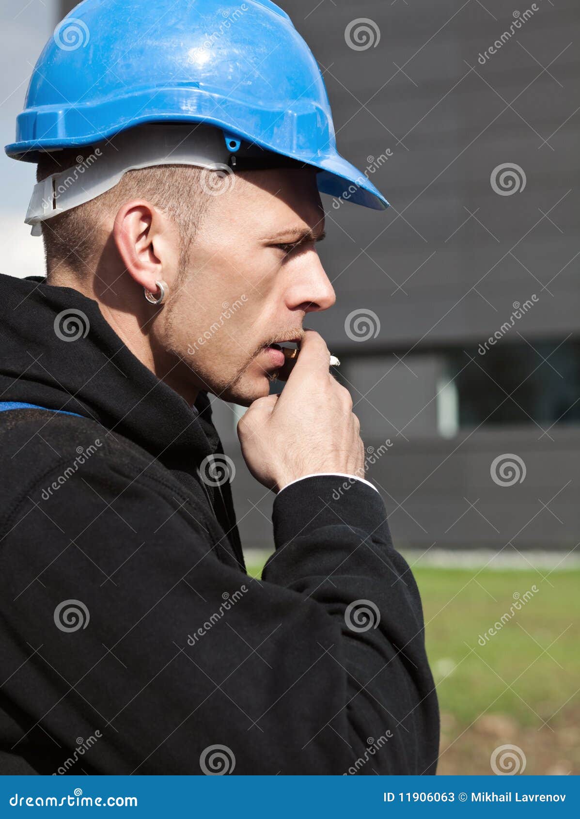 Smoking worker in hard hat stock image. Image of mature - 11906063