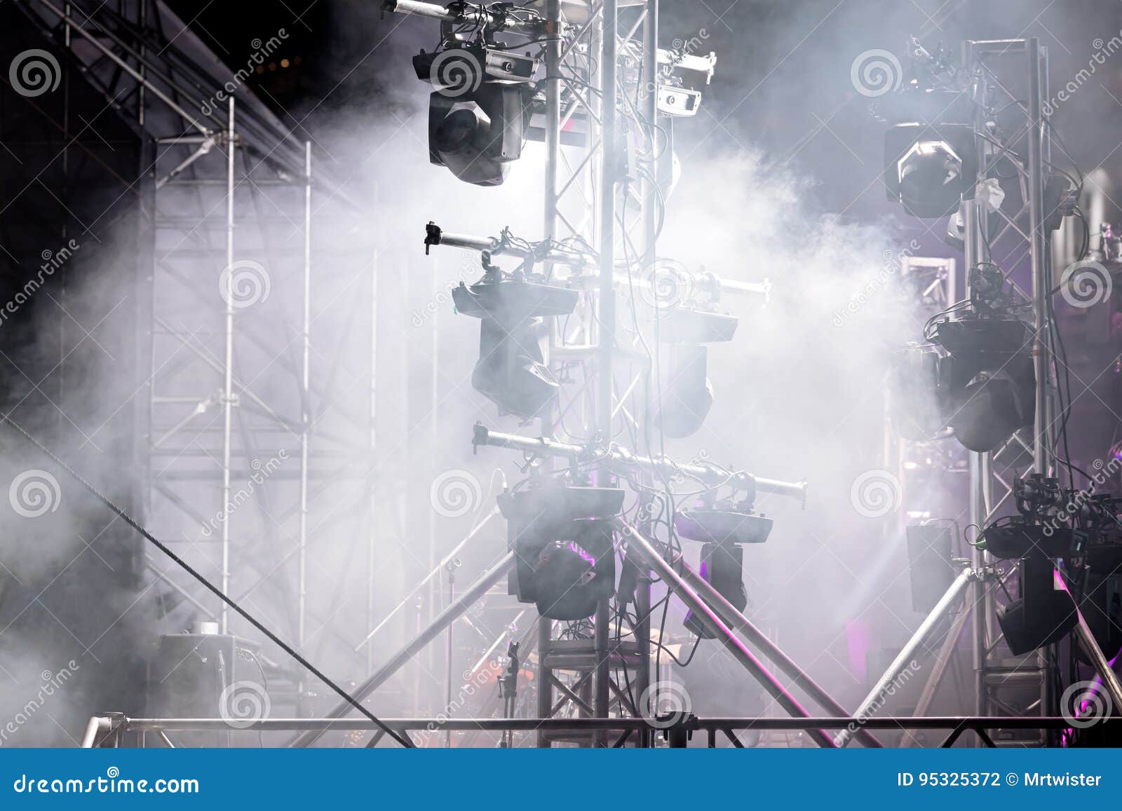 Smoky Stage Illuminated with Spotlight System during Concert Stock ...