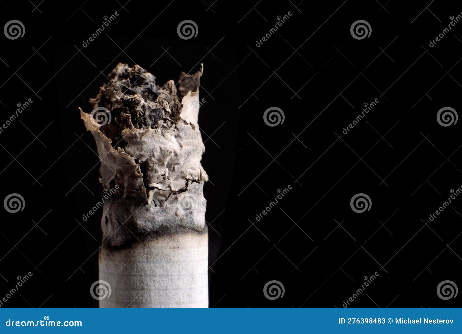 Smoldering Cigarette On A Black Background Royalty-Free Stock Photo ...