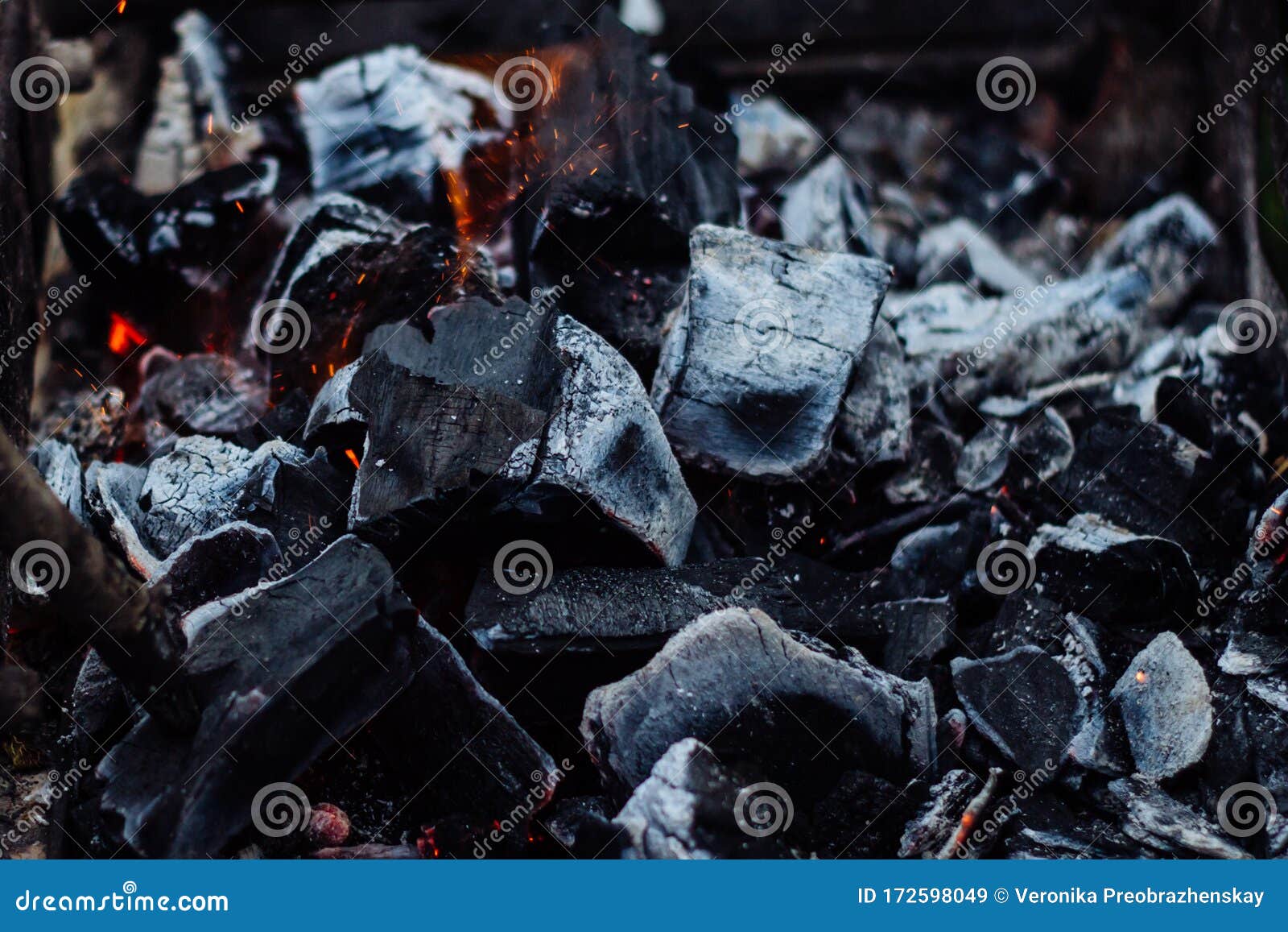 Smoldering Coals on the Grill with Sparks. Bonfire Texture Stock Image ...