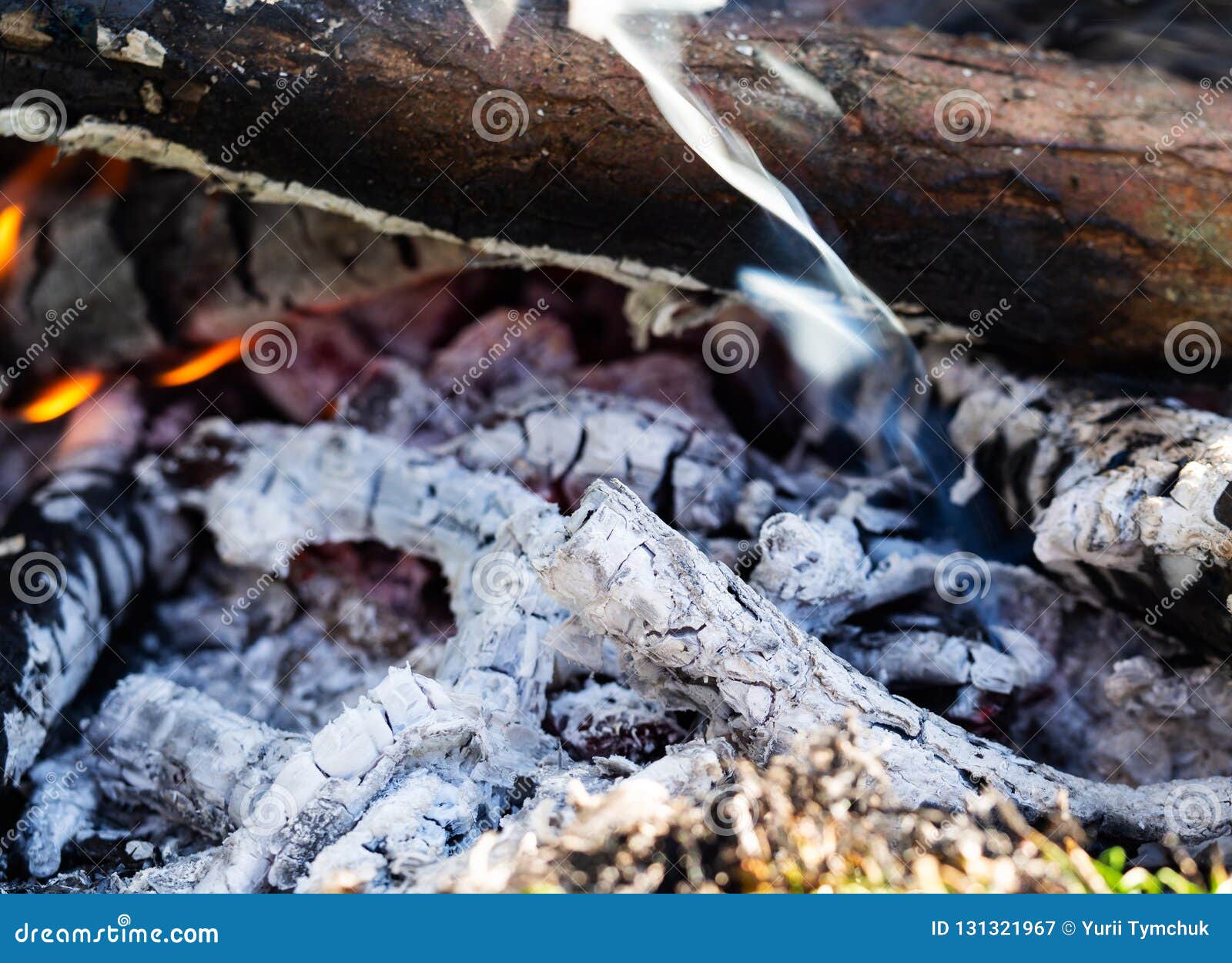 Smoldering Embers of Fire with Log in Smoke, Close Up Stock Image ...