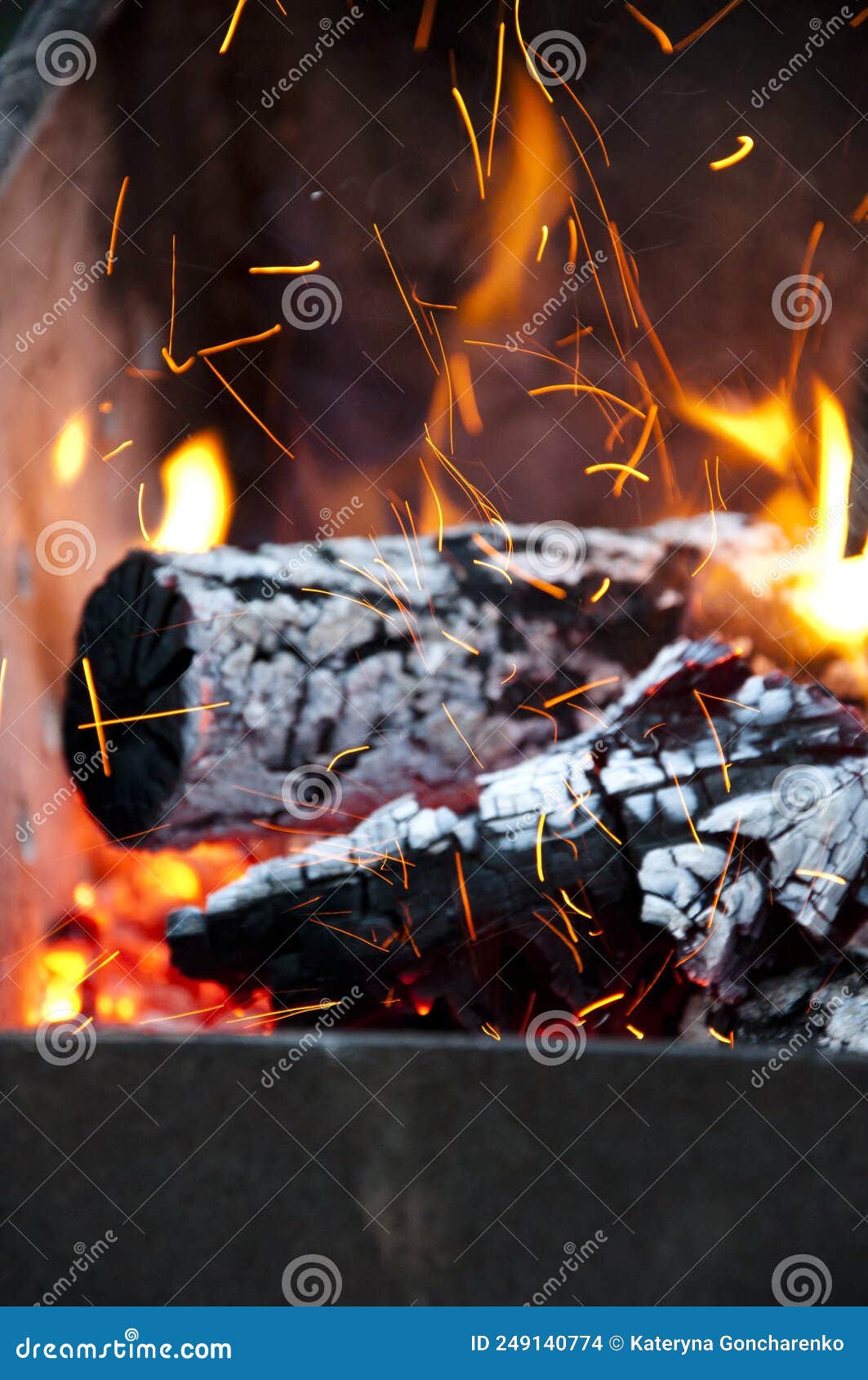 Smoldering Fire Wood with Flame Sparks Close View Abstract Background ...