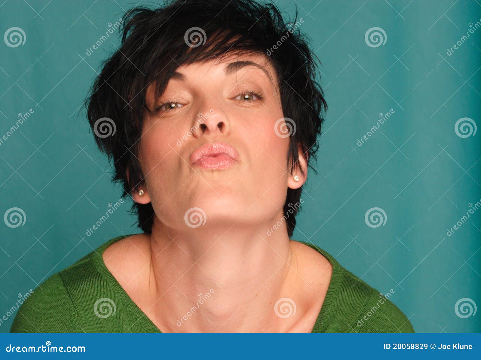 Smooch stock image. Image of face, female, expression - 20058829