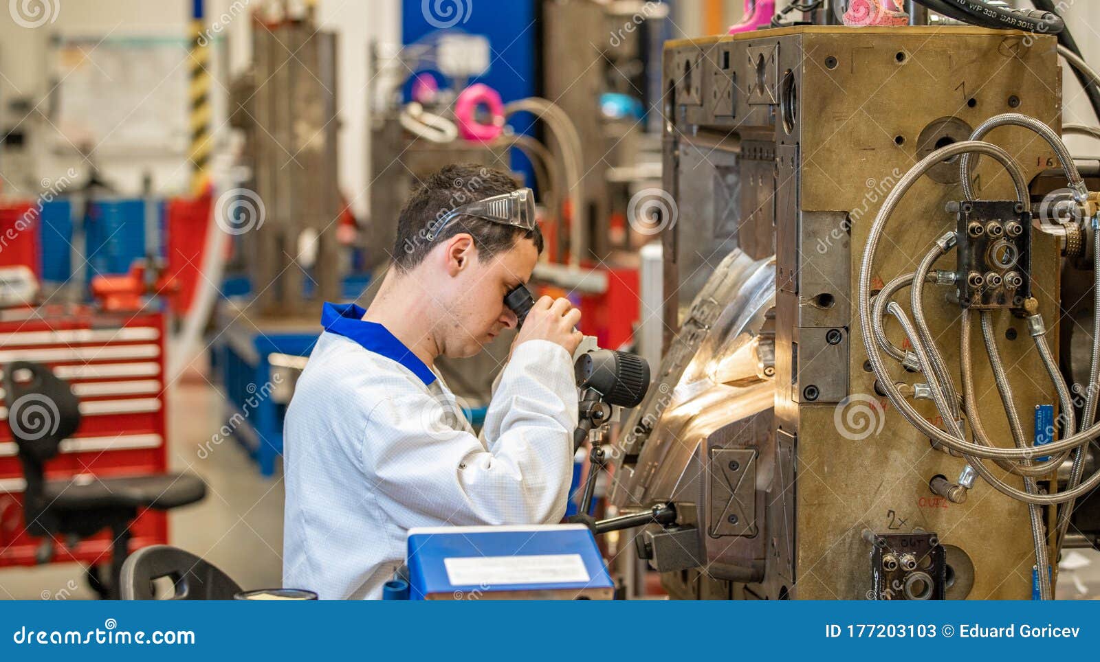 Smooth Accurate Work in the Factory Under Microscope Stock Image ...