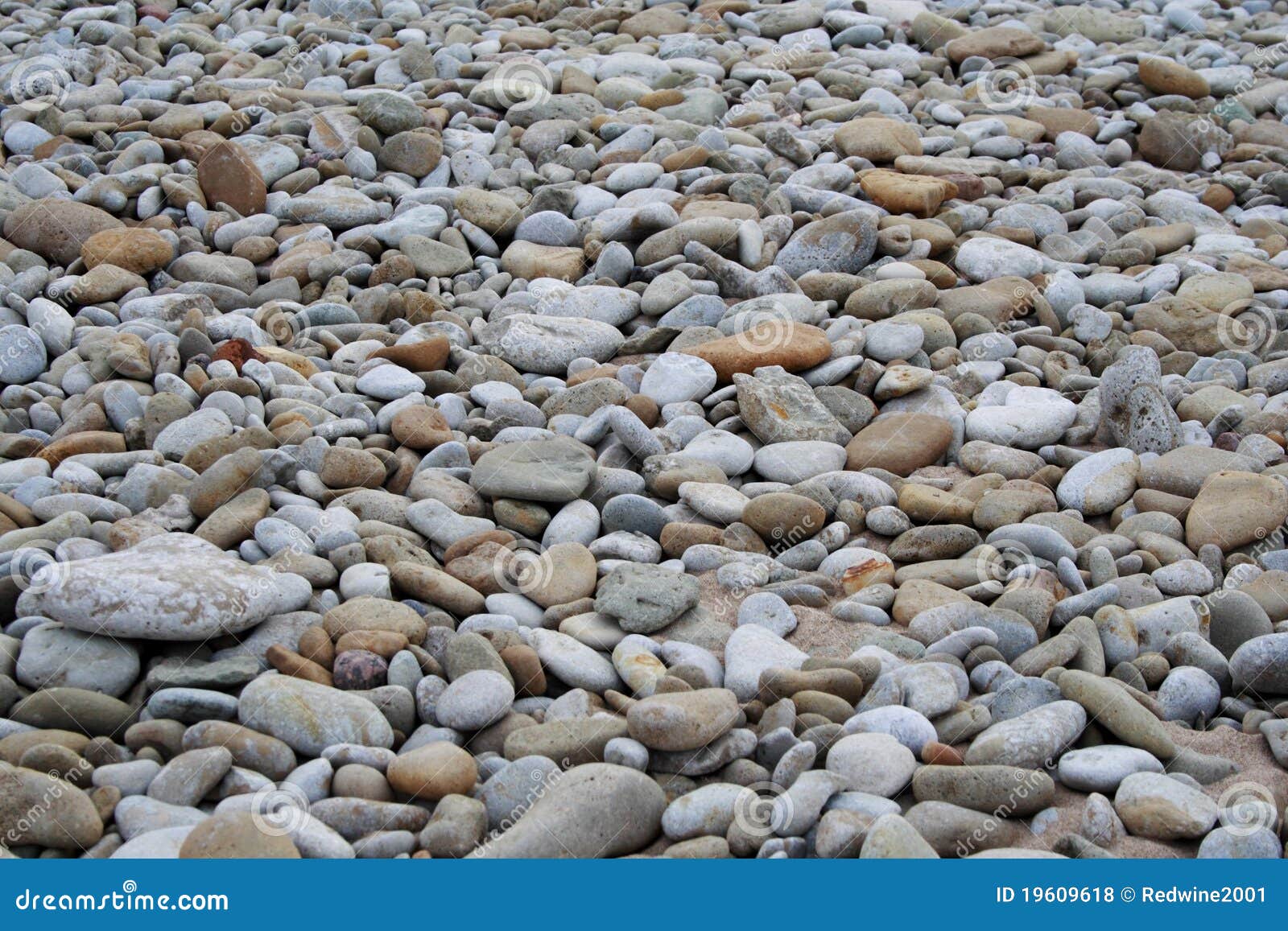 Smooth beach stones stock photo. Image of colorful, mineral - 19609618