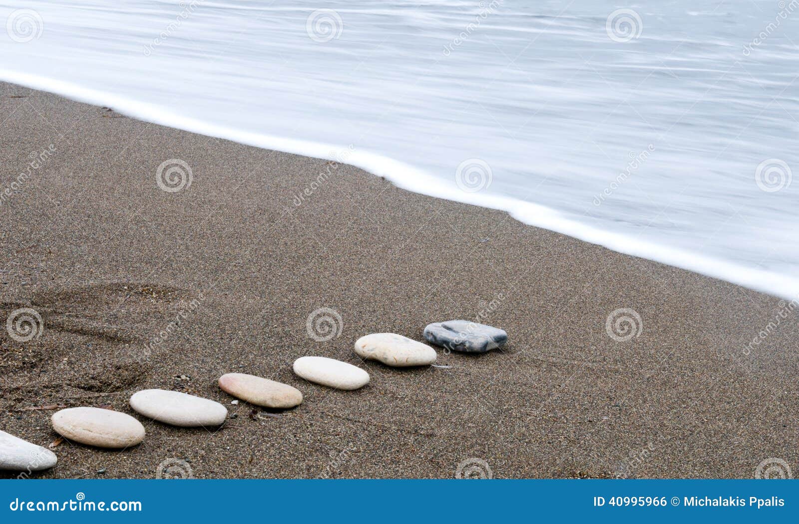 Smooth Beach Stones in a Row Stock Photo - Image of seawave, calmness ...