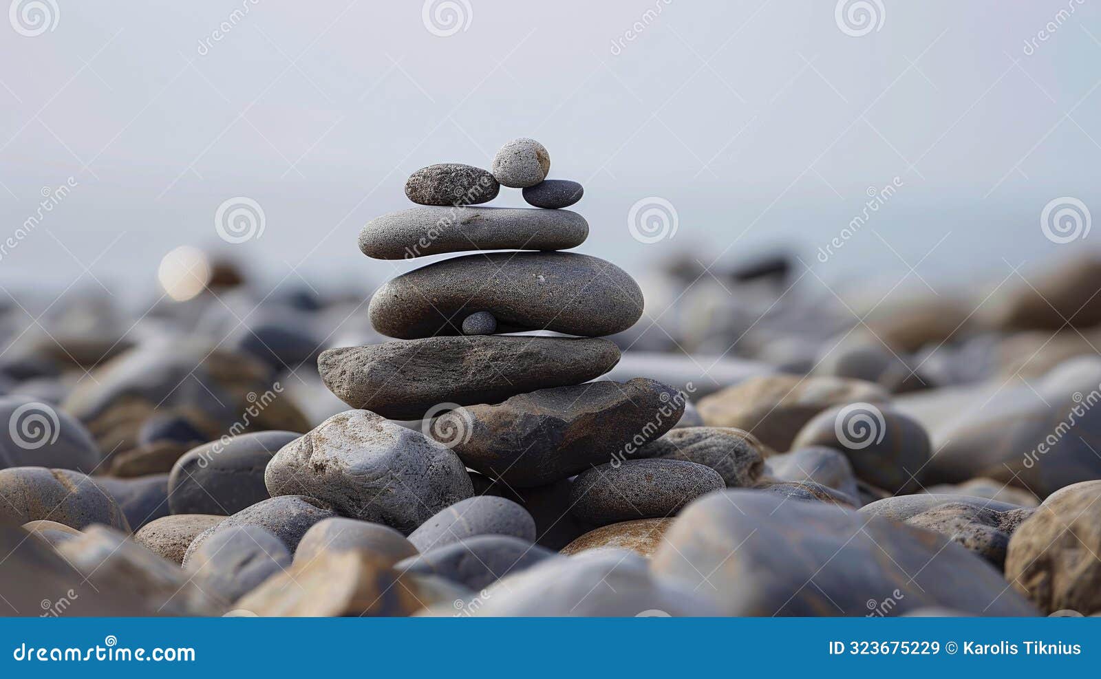 Balanced Grey Stone Stack on Rocky Surface with Blurred Background ...