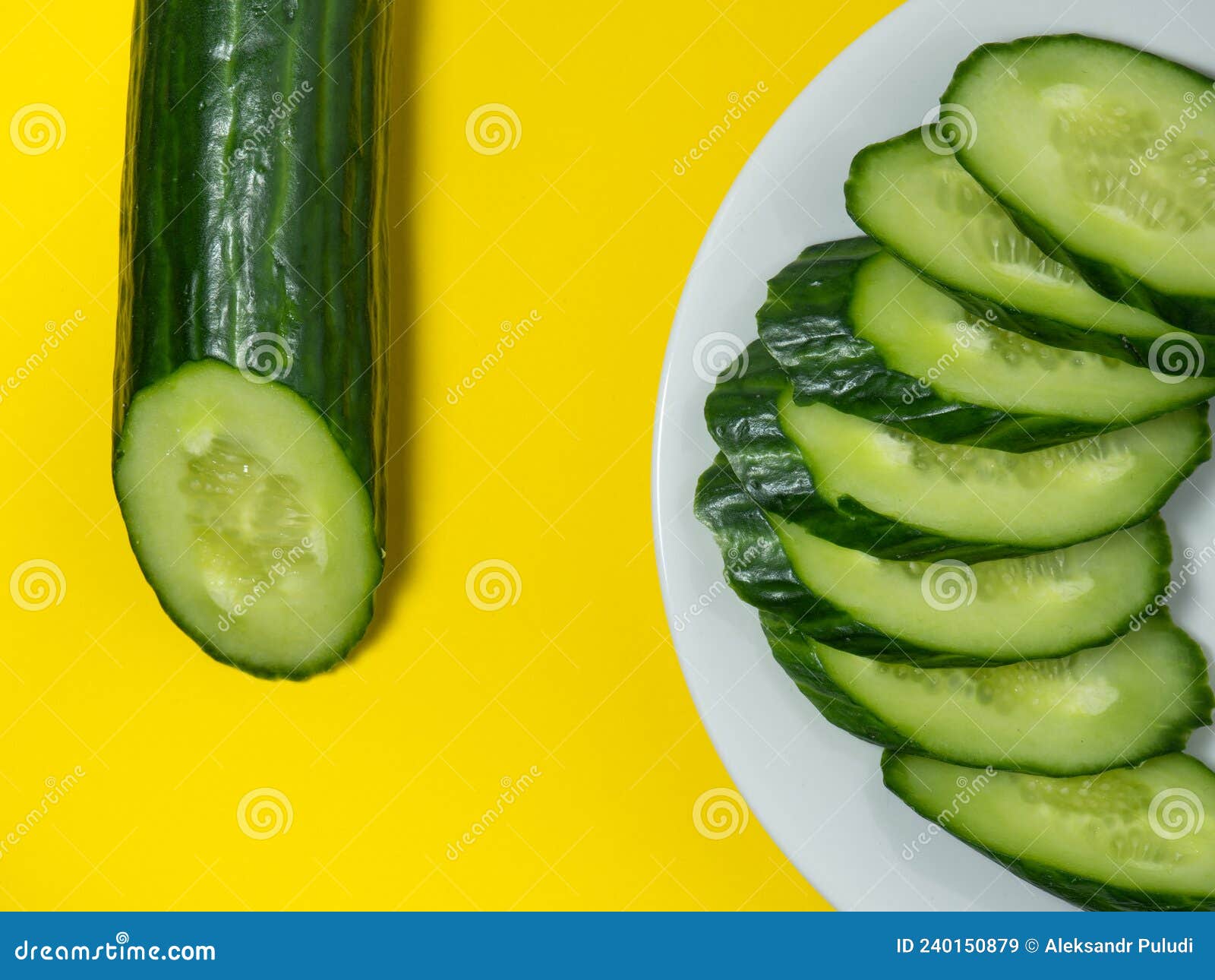 A Smooth, Medium-sized Cucumber on a Plate, Sliced. Cucumber on a ...