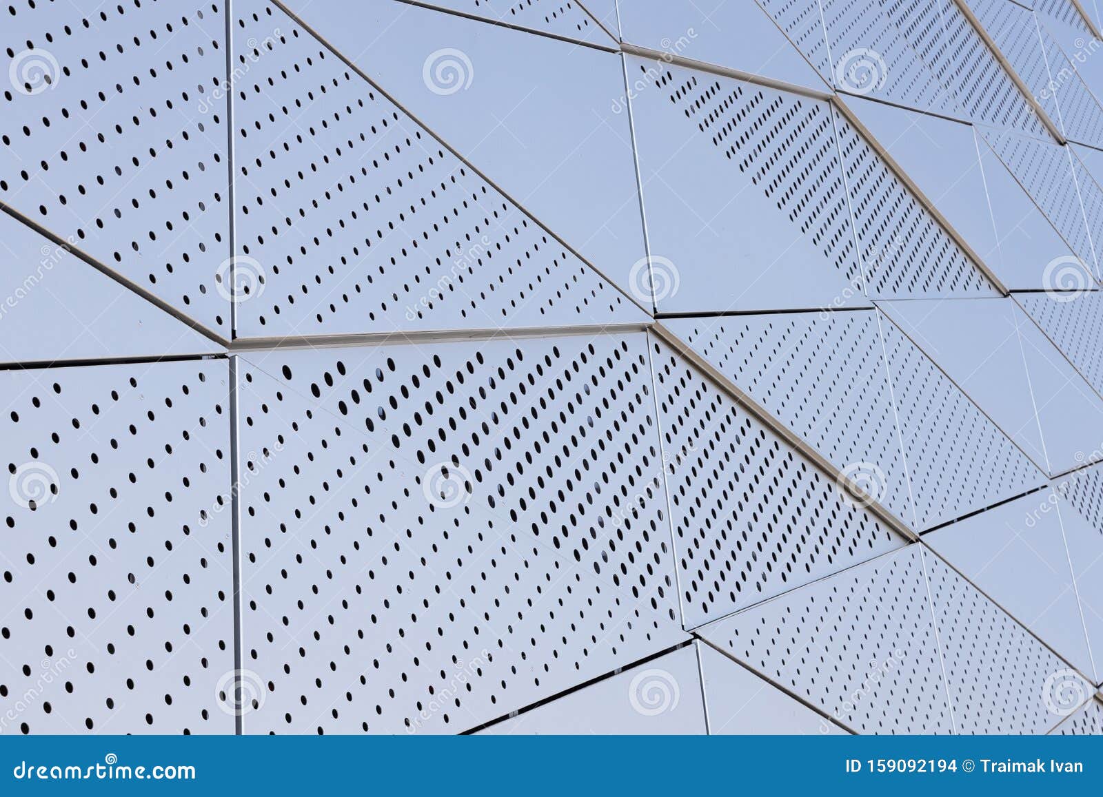 Smooth Metal Wall with Triangular Pattern and Round Openings Stock ...