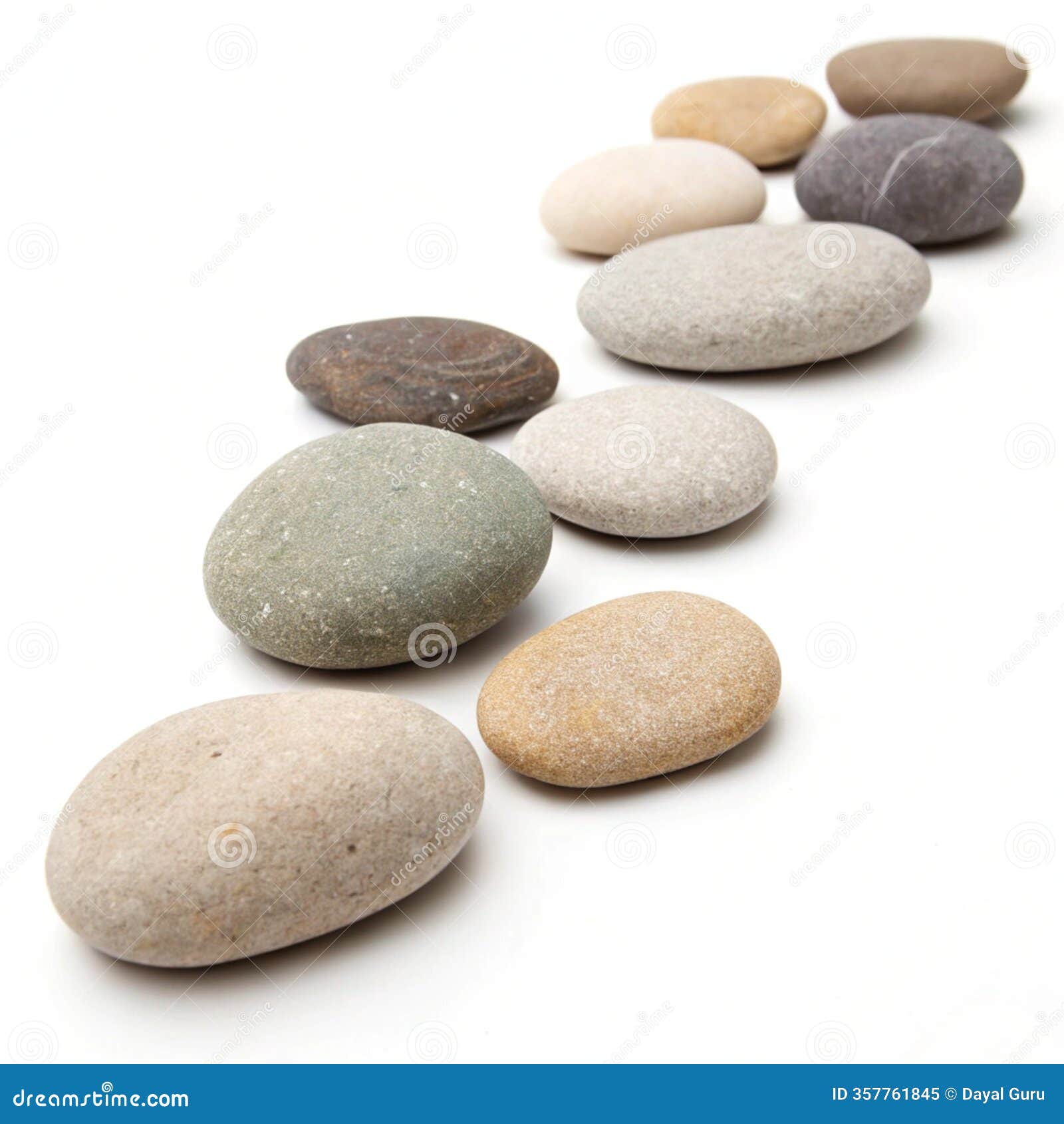 Smooth Pebbles Stack Into Two Balanced Cairns Against A Black ...