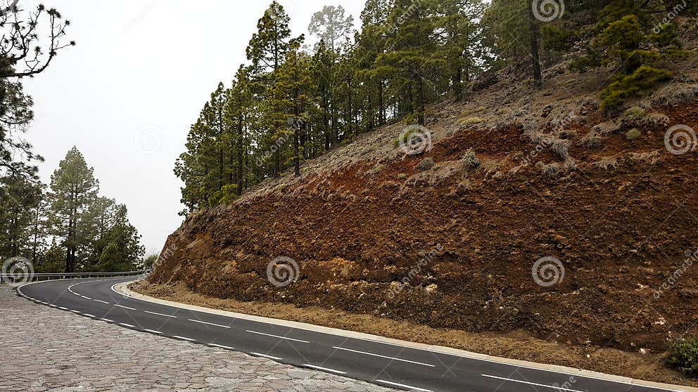 A Smooth Road on the Slope of a Cliff. Stock Photo - Image of slope ...