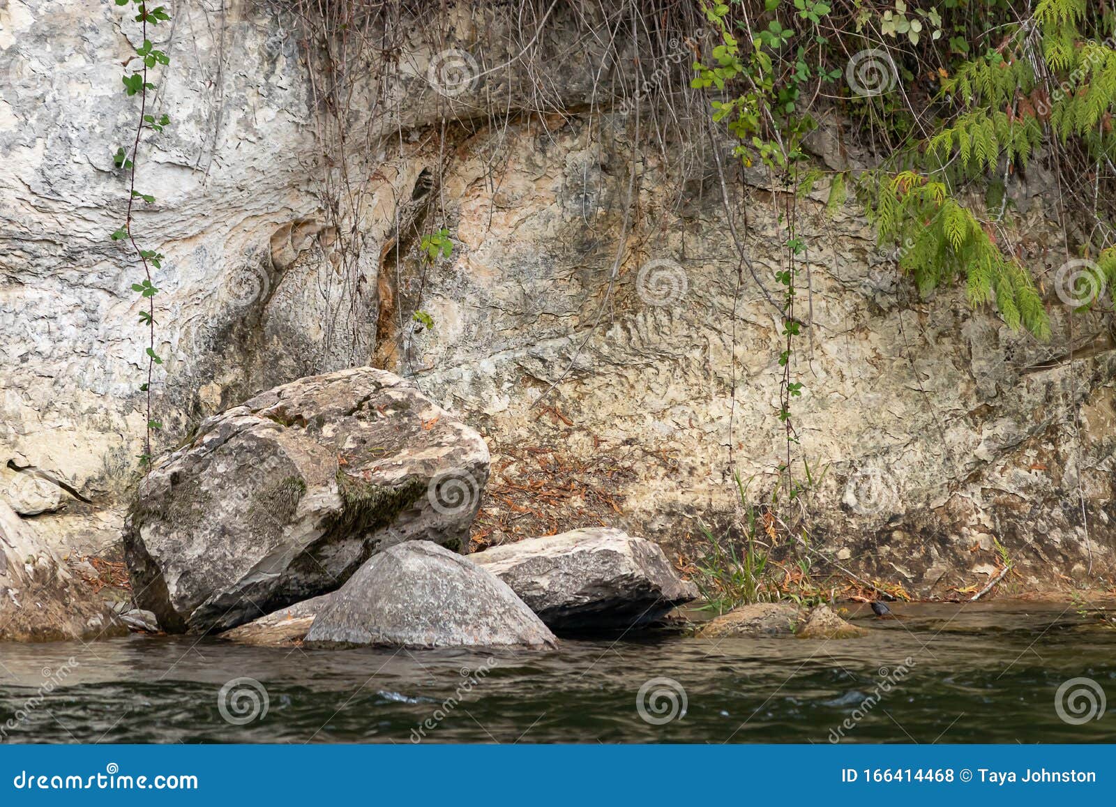 A Smooth Rock Wall on the Edge of a River Stock Photo - Image of high ...
