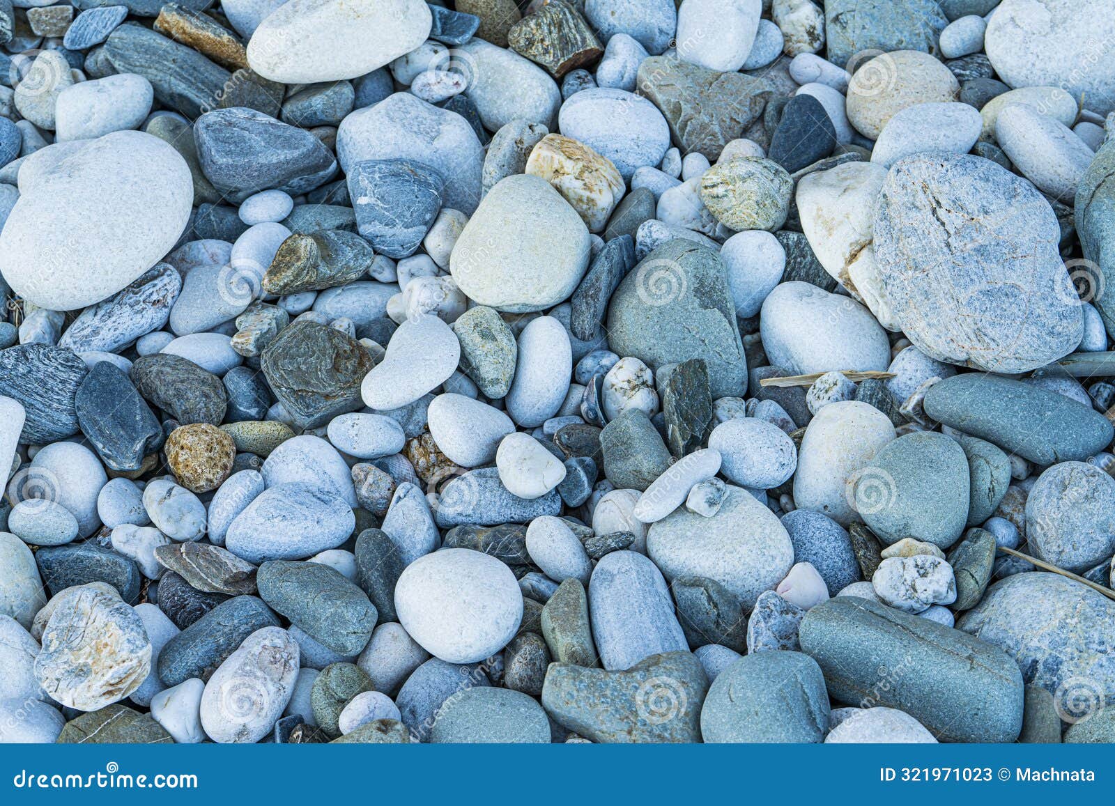 Grey Pebbles On Beach At Sunset With Pink Glow Grom Sunset On So Stock ...
