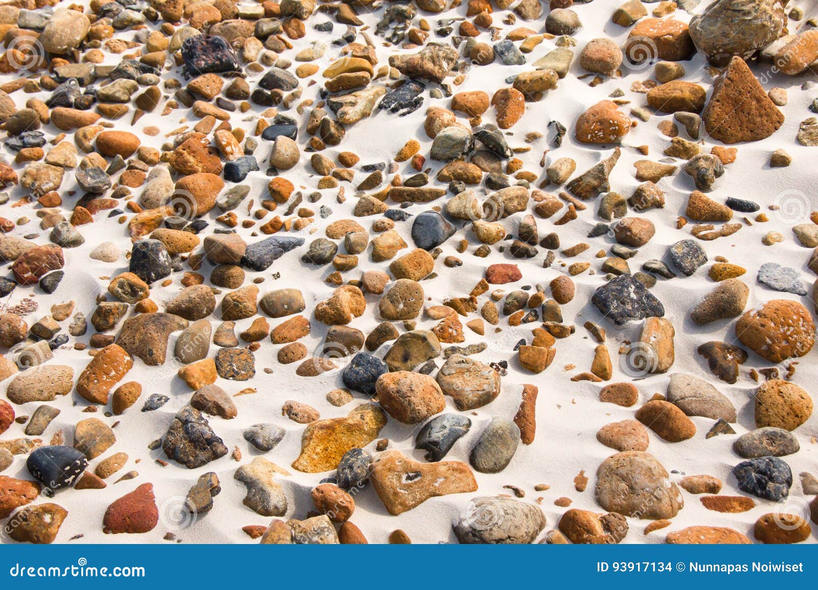 Smooth Round Pebble Stones on the Sand Beach Backgound Stock Photo ...