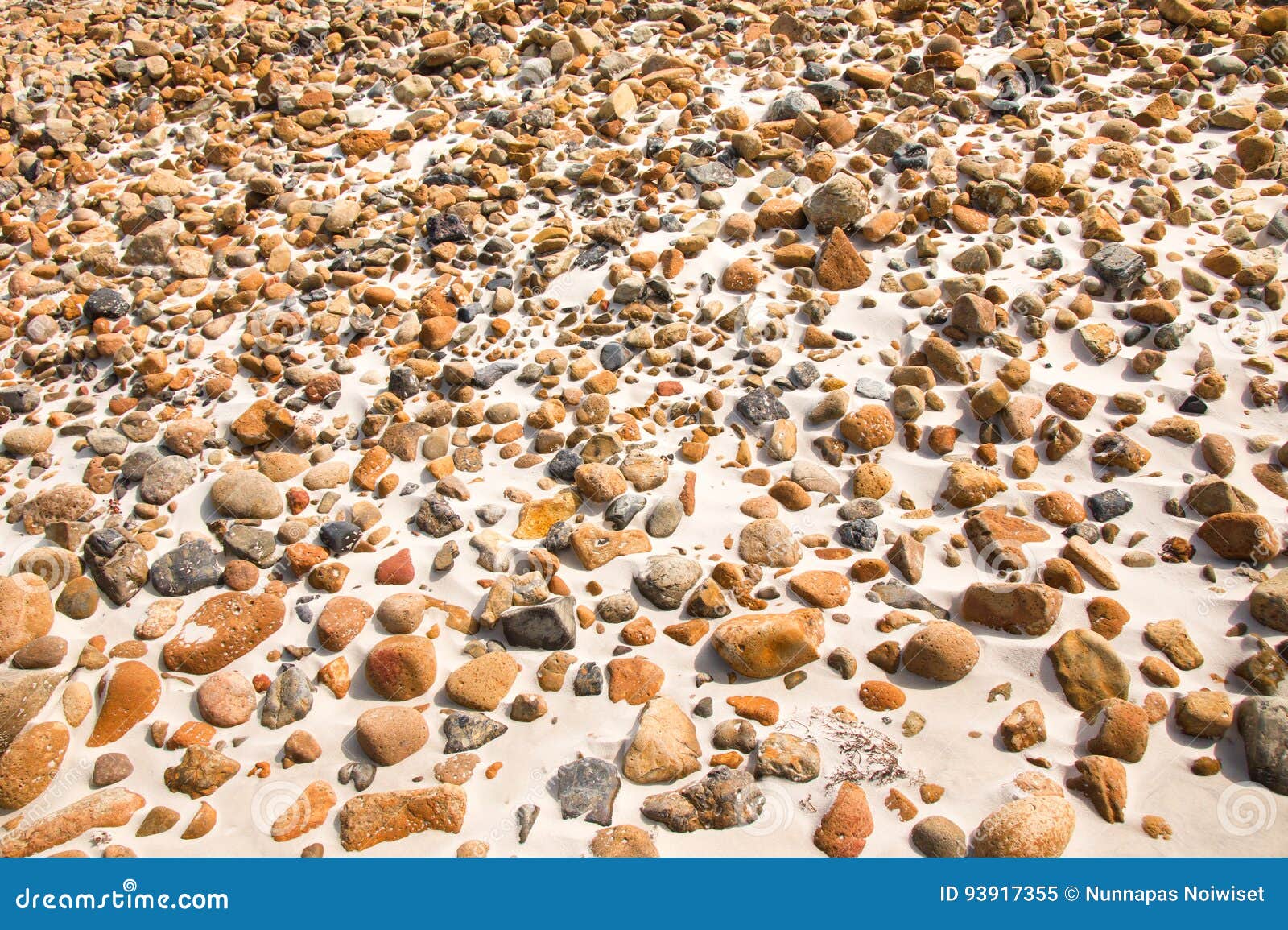 Smooth Round Pebble Stones on the Sand Beach Backgound Stock Image ...