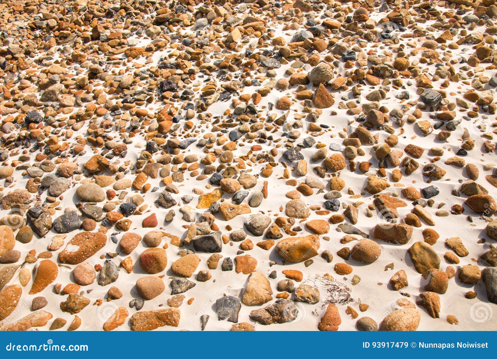 Smooth Round Pebble Stones on the Sand Beach Backgound Stock Image ...