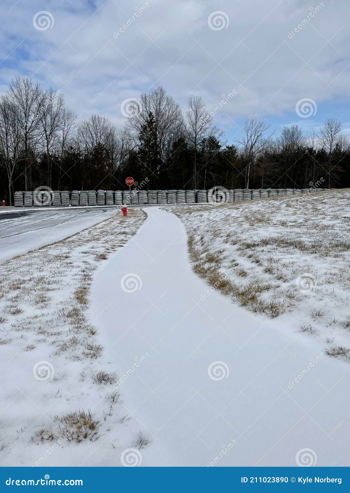 A Smooth and Snowy Path stock photo. Image of morning - 211023890